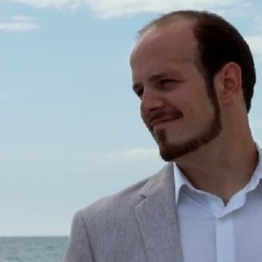 Is fabric or vinyl better for event backdrops?